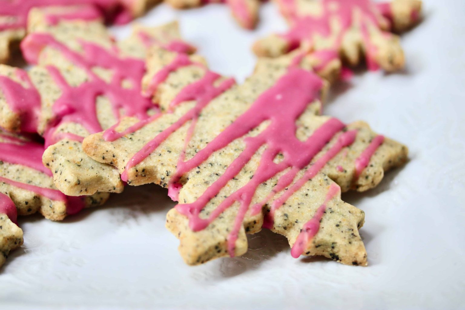 Earl Grey Shortbread Snowflakes with Blood Orange Glaze - Stellina Sweets